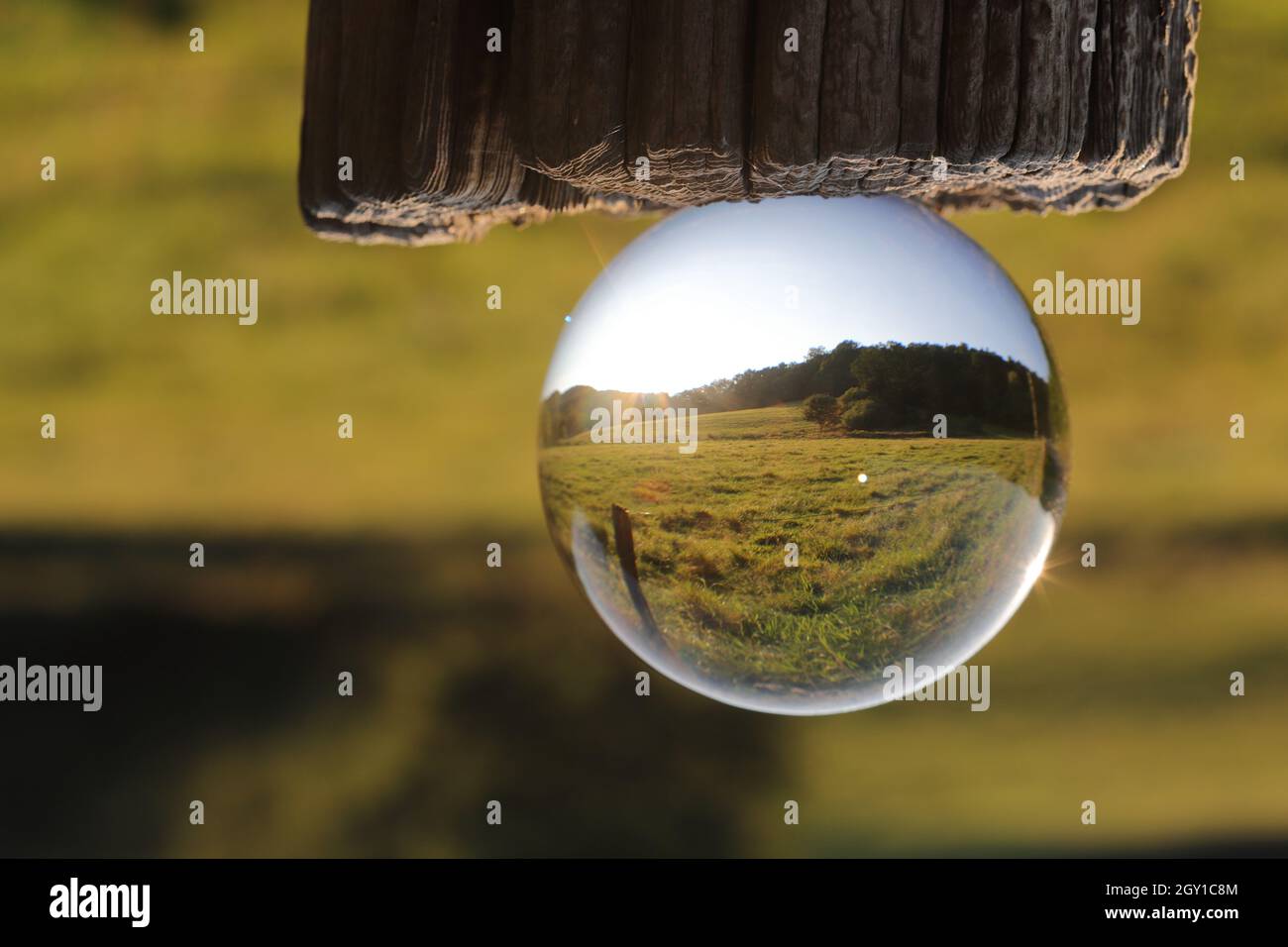 a beautiful landscape photographed through a lens ball Stock Photo - Alamy