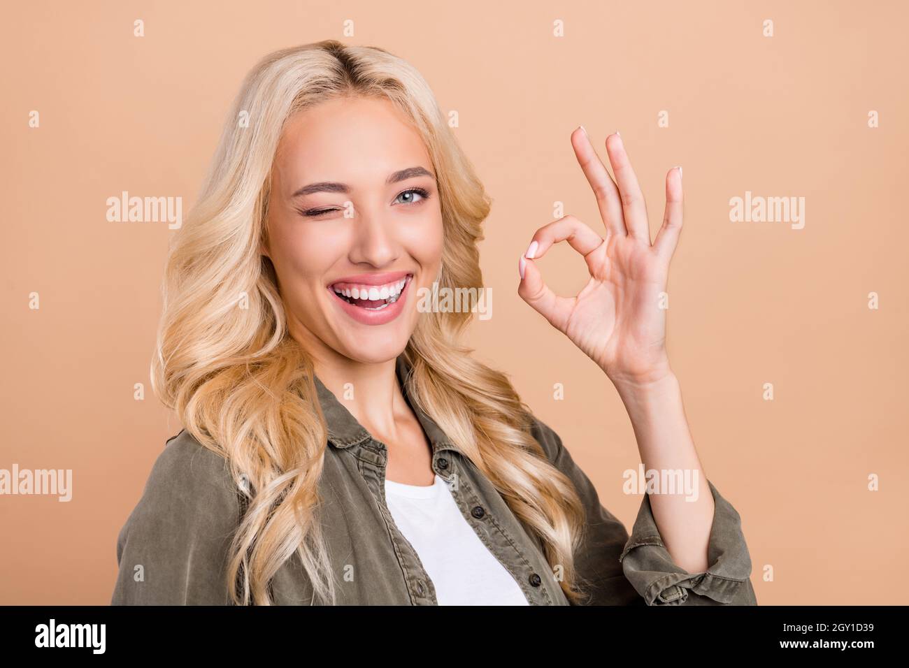 Profile side photo of young girl happy positive smile wink eye show ...