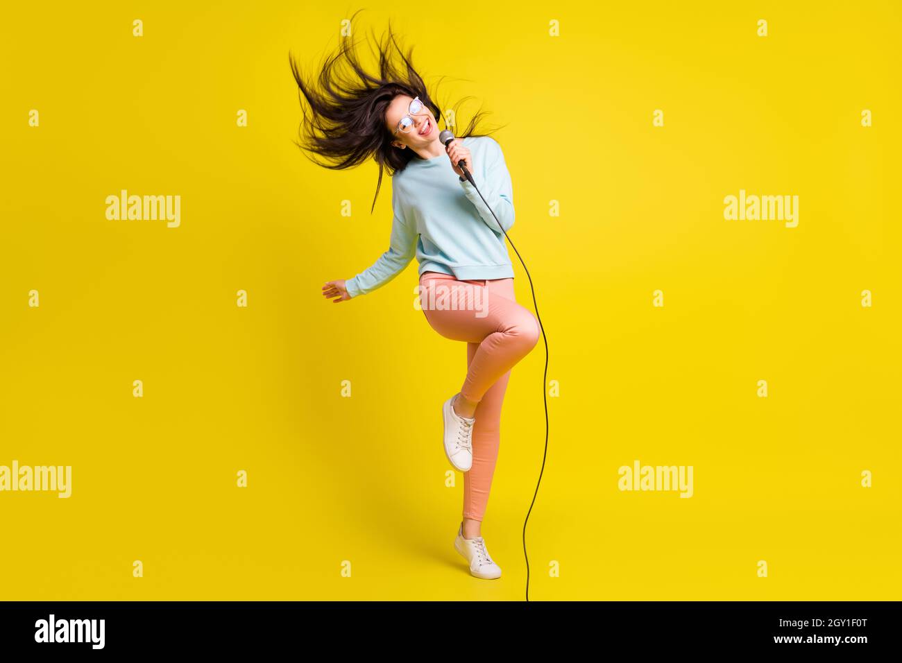 Full length body size photo girl dancing singing in karaoke with ...