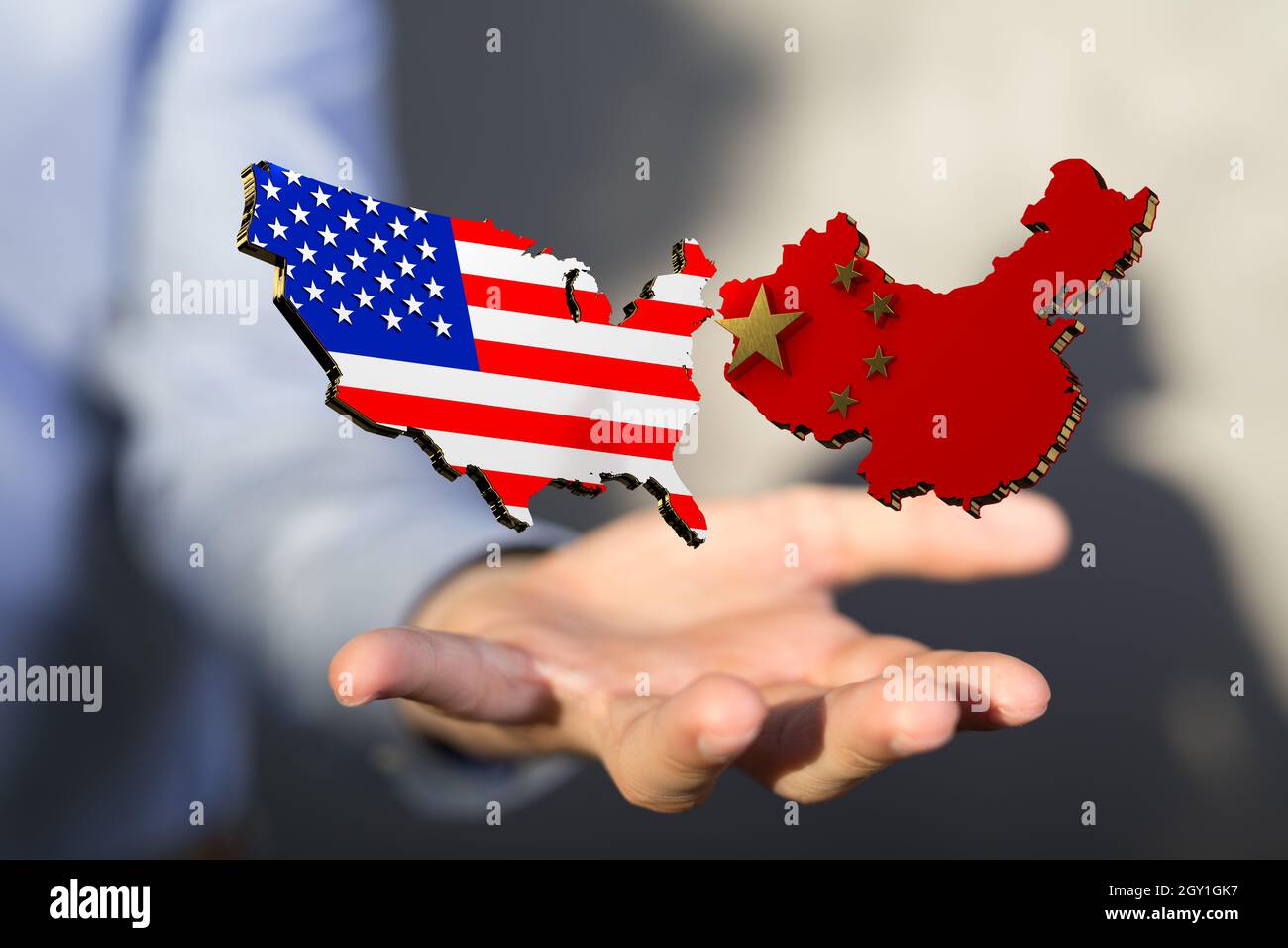 Close up shot of a 3d render USA and China trade partner maps in a hand ...