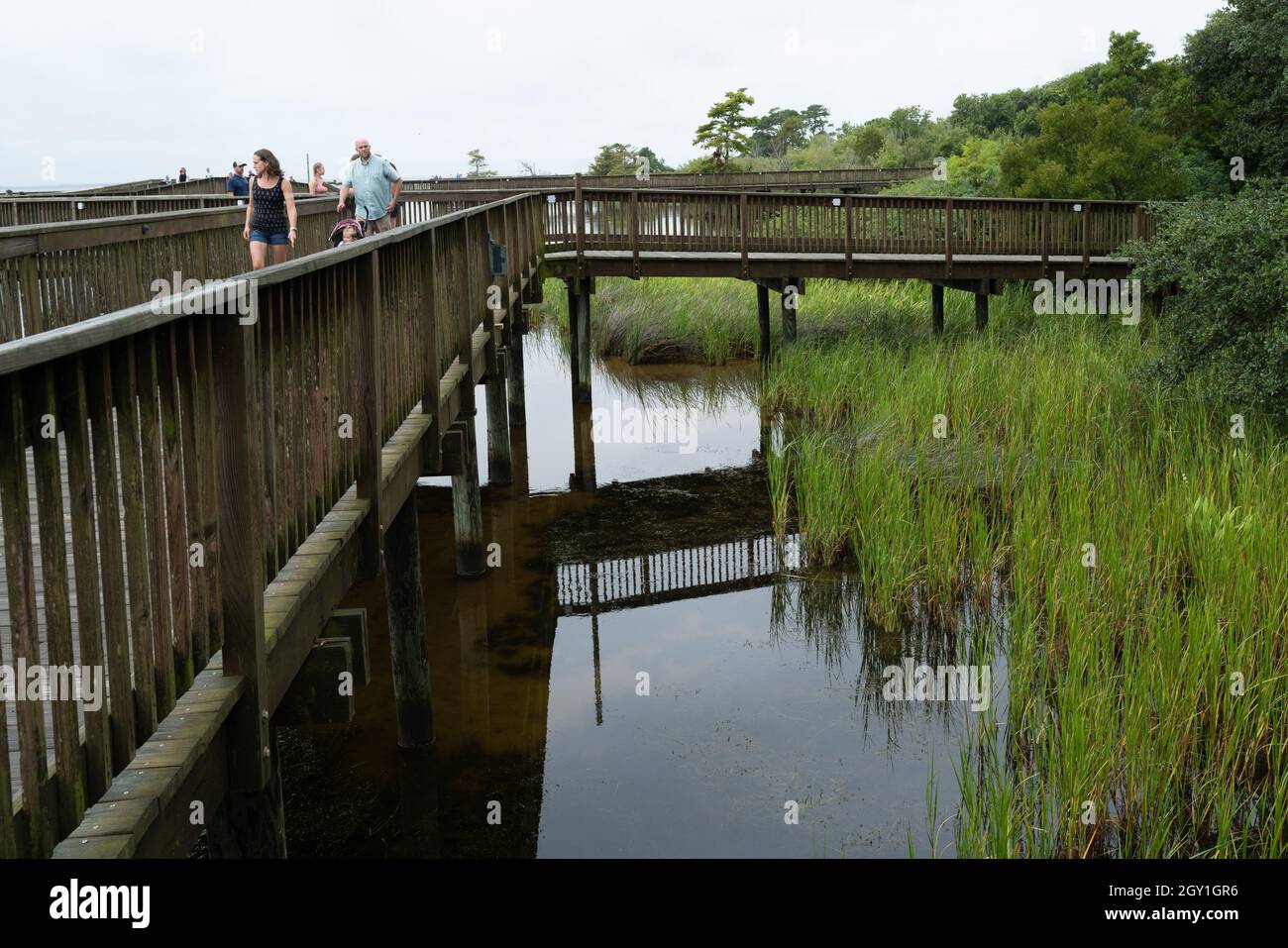 Duck, NC, USA -- August 4,2021. A wide angle landscape photo of people ...