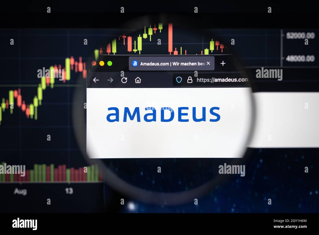 Amadeus company logo on a website with blurry stock market developments ...