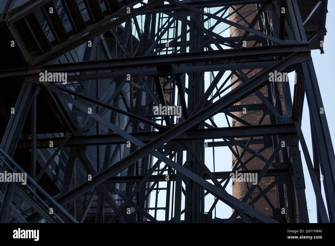 Metal construction which is a part of steel mill industry building ...