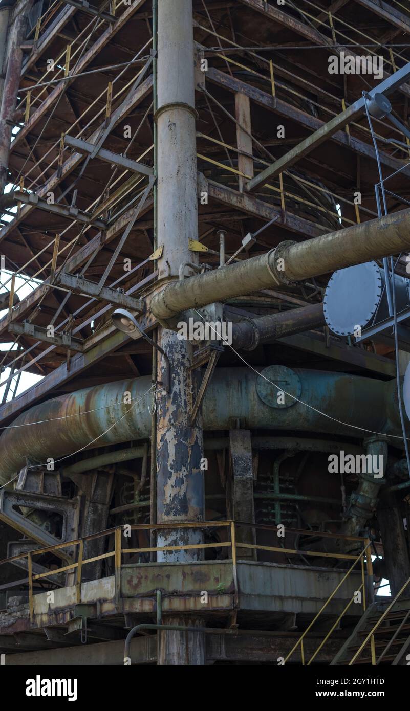 Metal construction which is a part of steel mill industry building ...