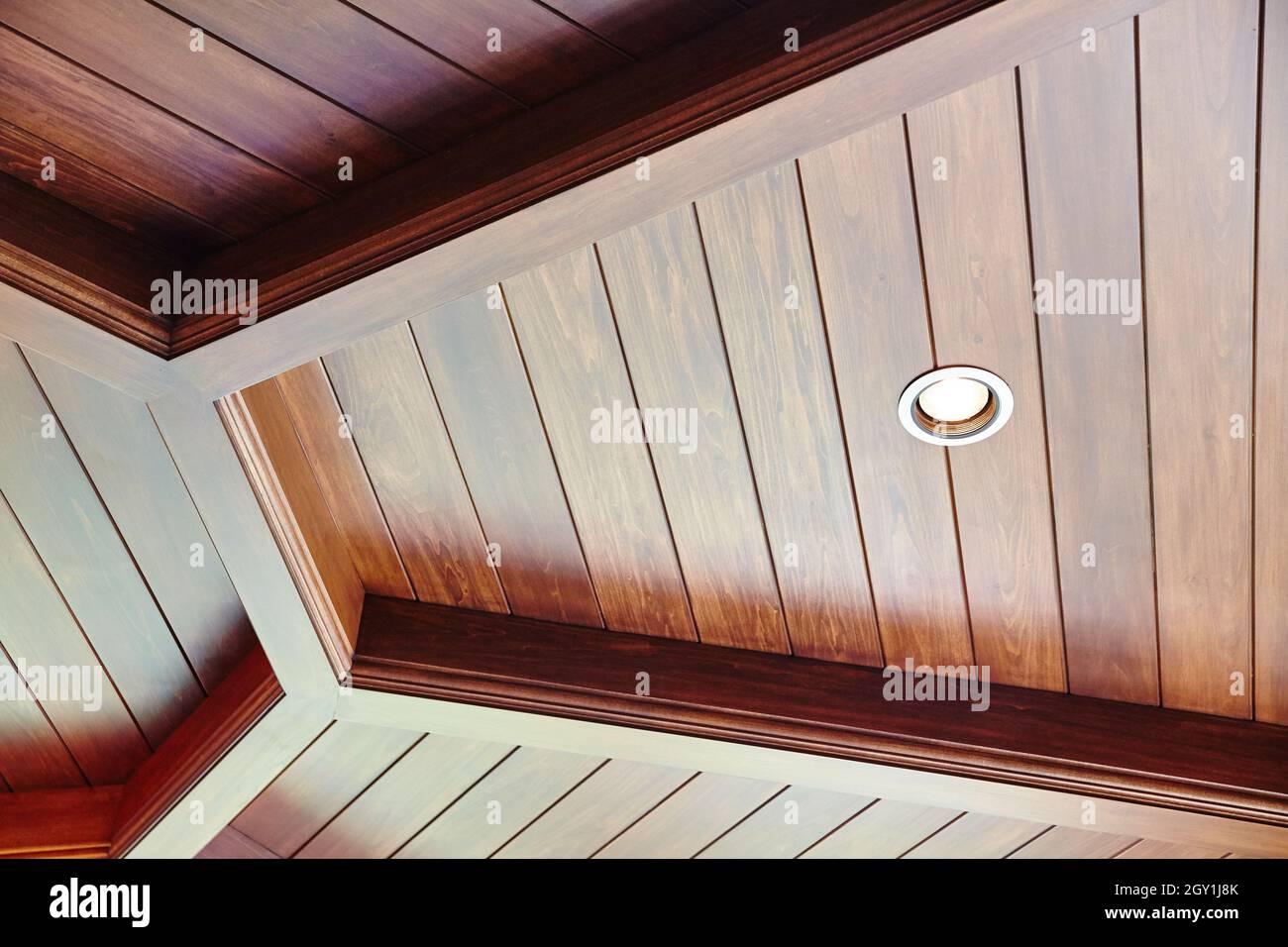 Well finished fancy looking wooden ceiling with geometric lines and ...