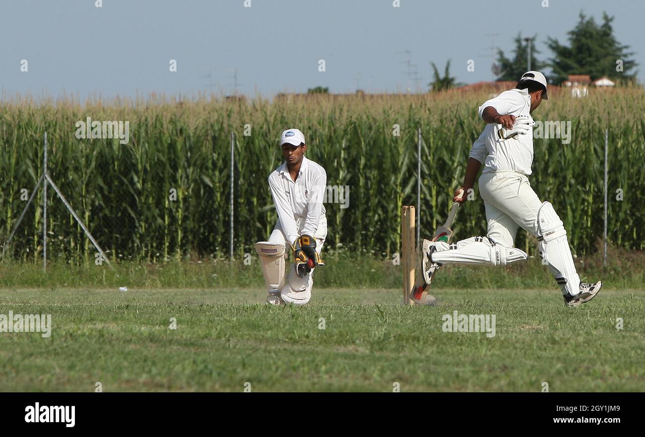 Cricket, game, sport, athletes, team Stock Photo - Alamy