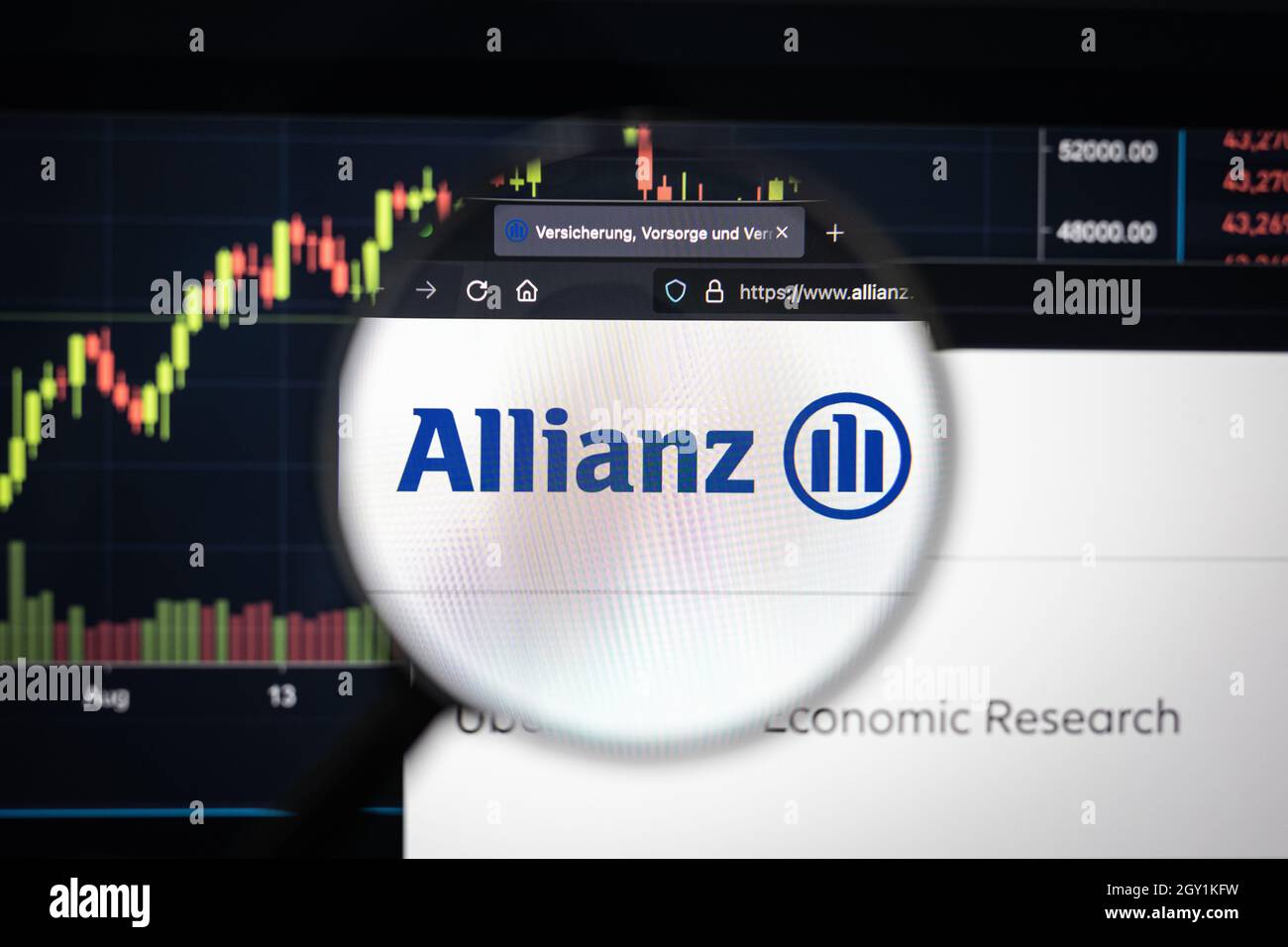 Allianz company logo on a website with blurry stock market developments ...