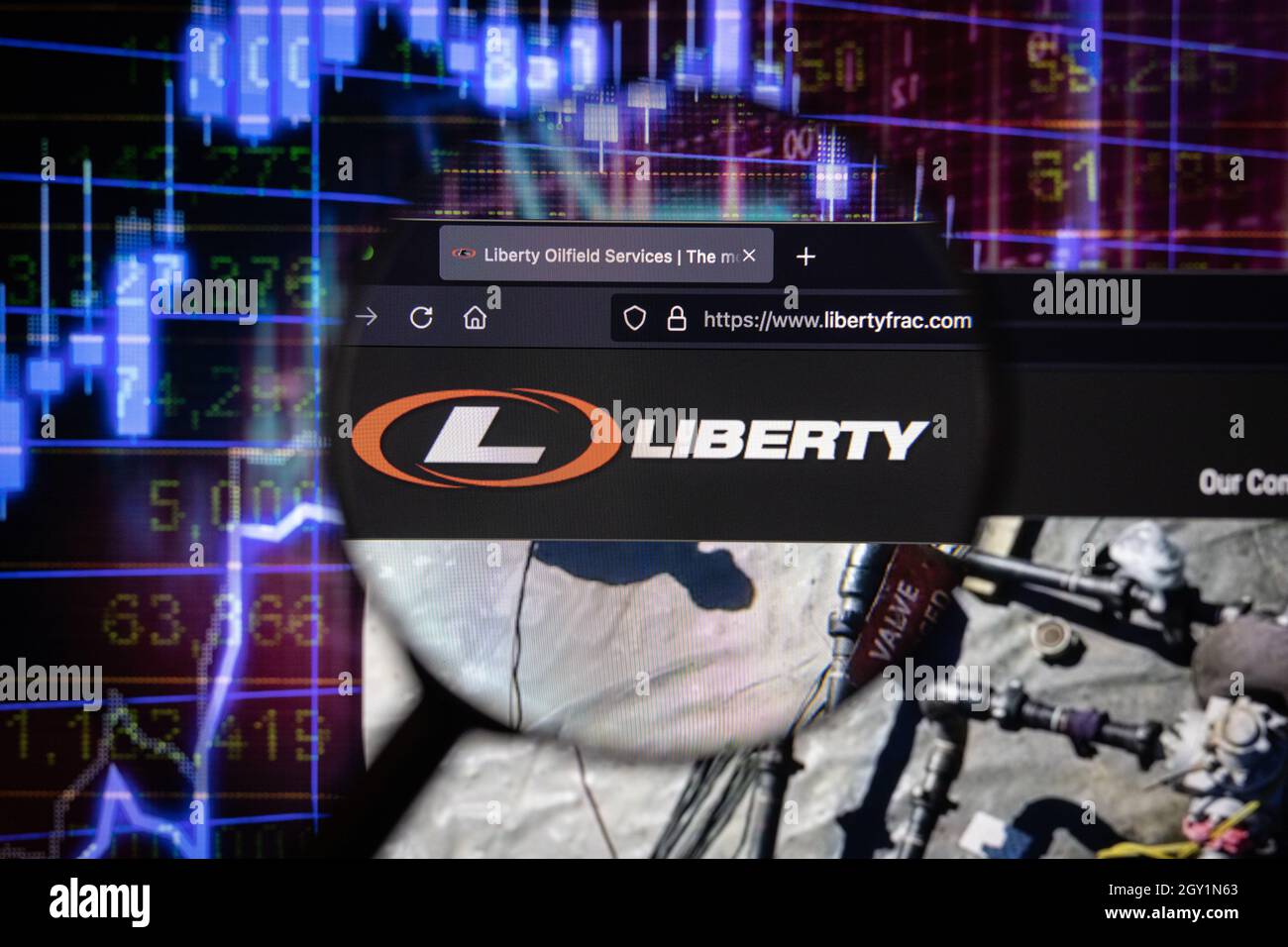 Liberty company logo on a website with blurry stock market developments in the background, seen ...