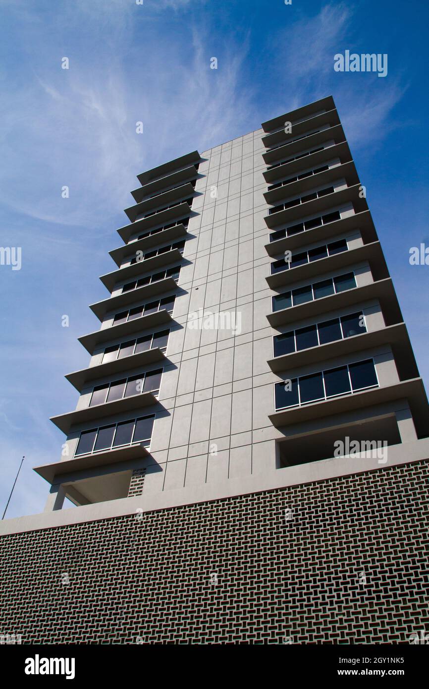 Tall building reaches blue hi-res stock photography and images - Alamy