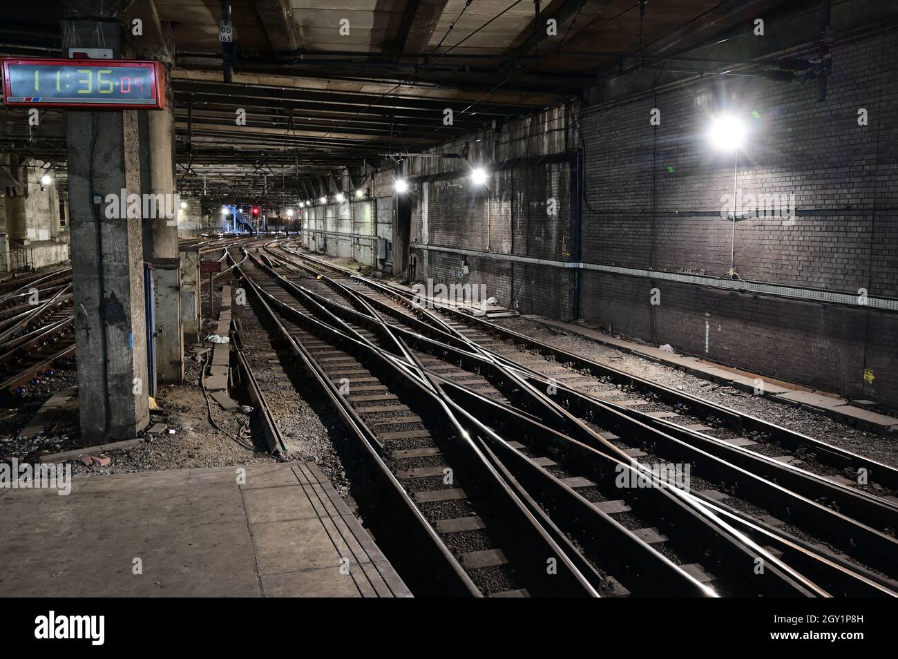 Underground tracks at a London railway station Stock Photo - Alamy