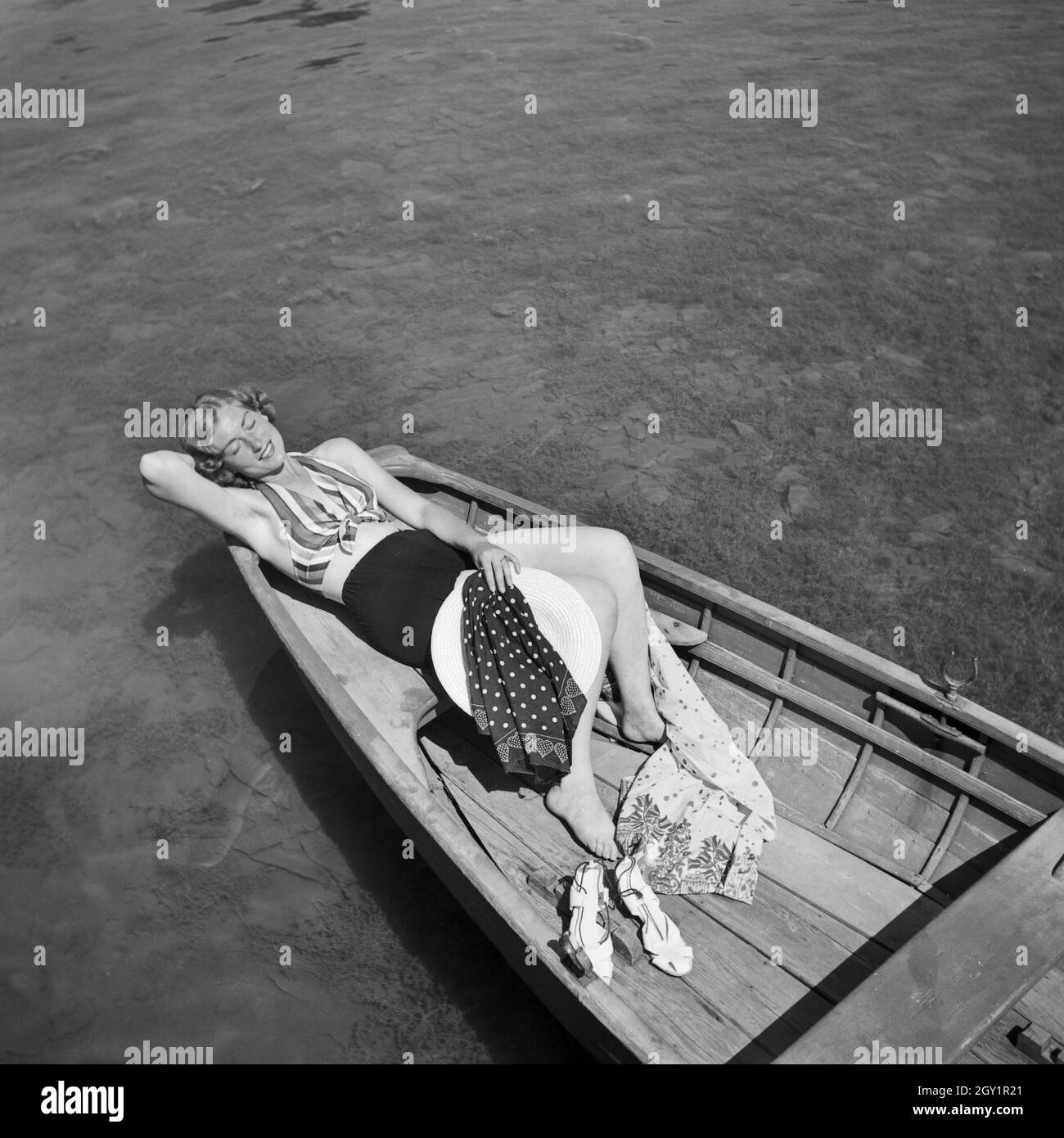 1930s woman rowing boat hi-res stock photography and images - Alamy