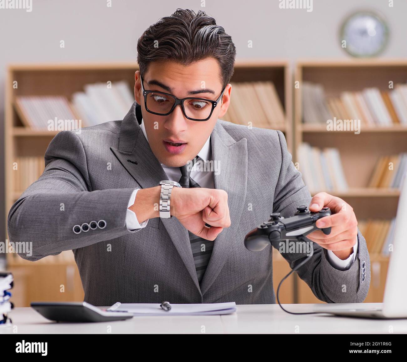 The businessman playing computer games at work office Stock Photo - Alamy