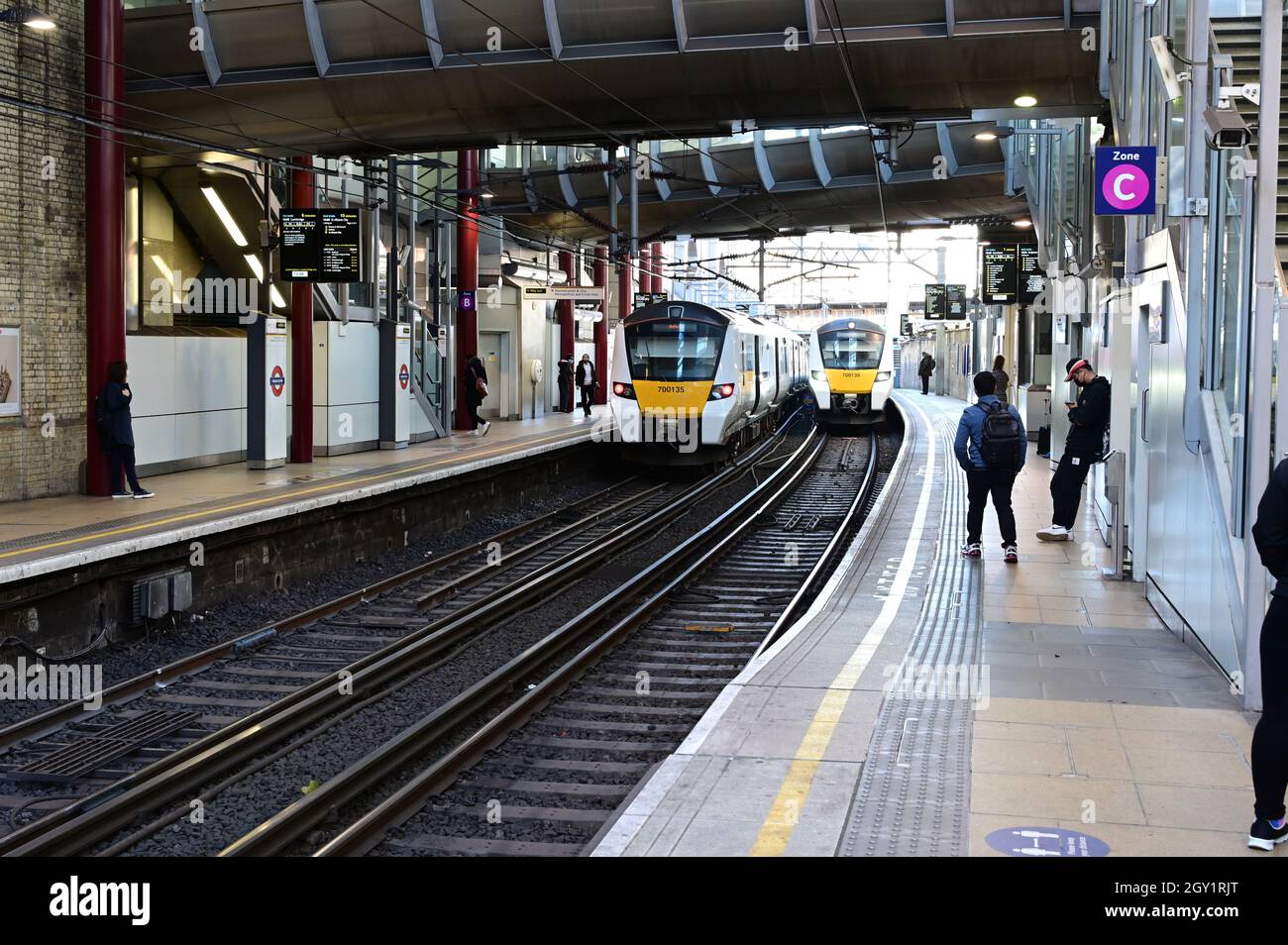 Farringdon, London, UK- October 06 2021: One train arriving and one ...