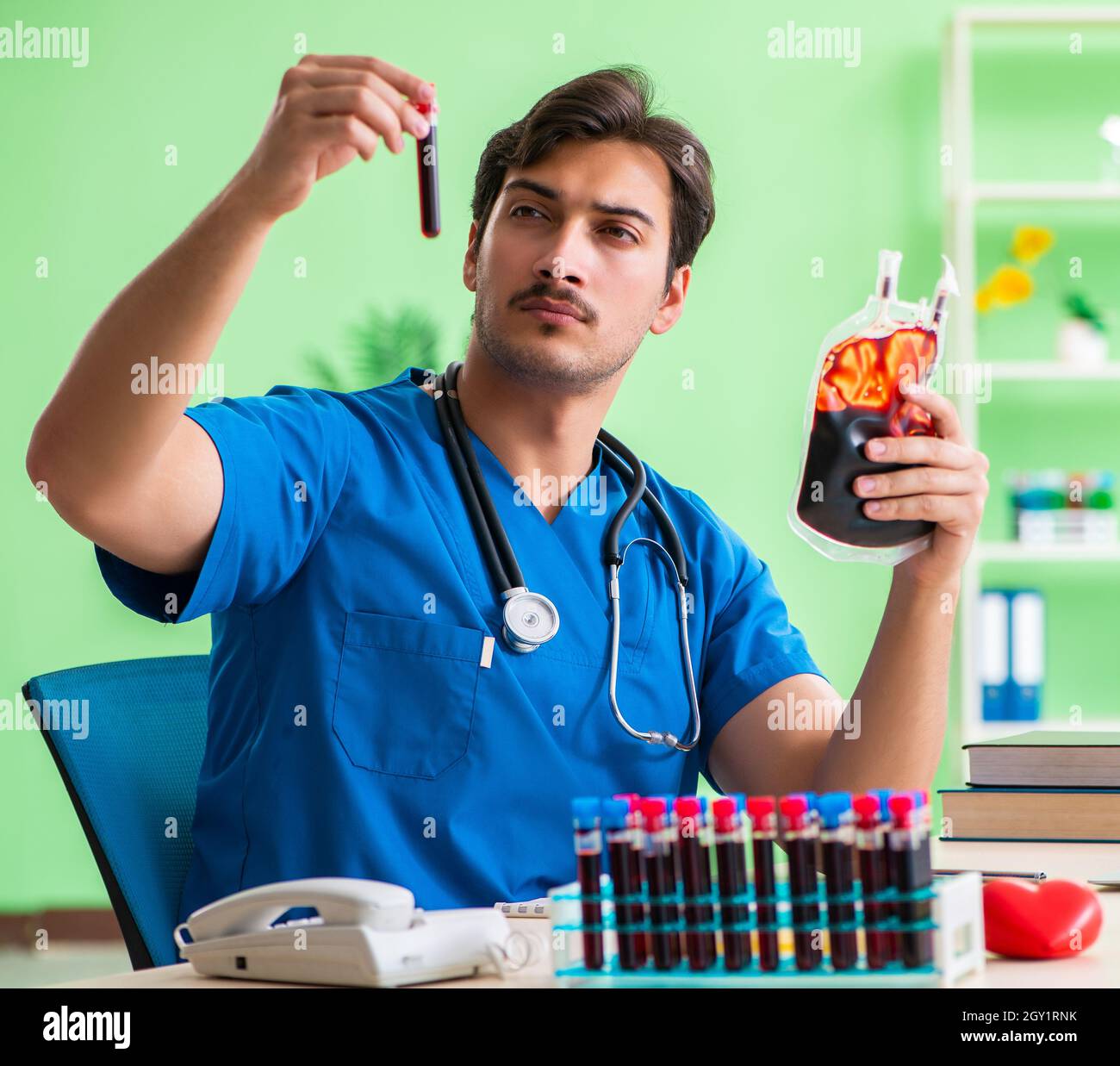The doctor doing blood analysis in the lab Stock Photo - Alamy