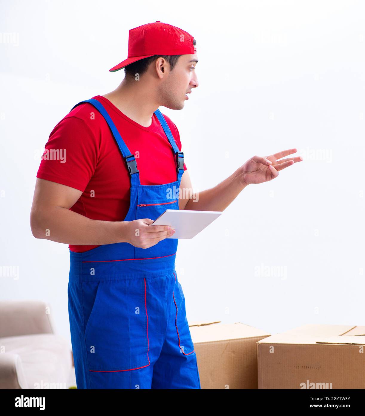 The contractor worker moving boxes during office move Stock Photo - Alamy