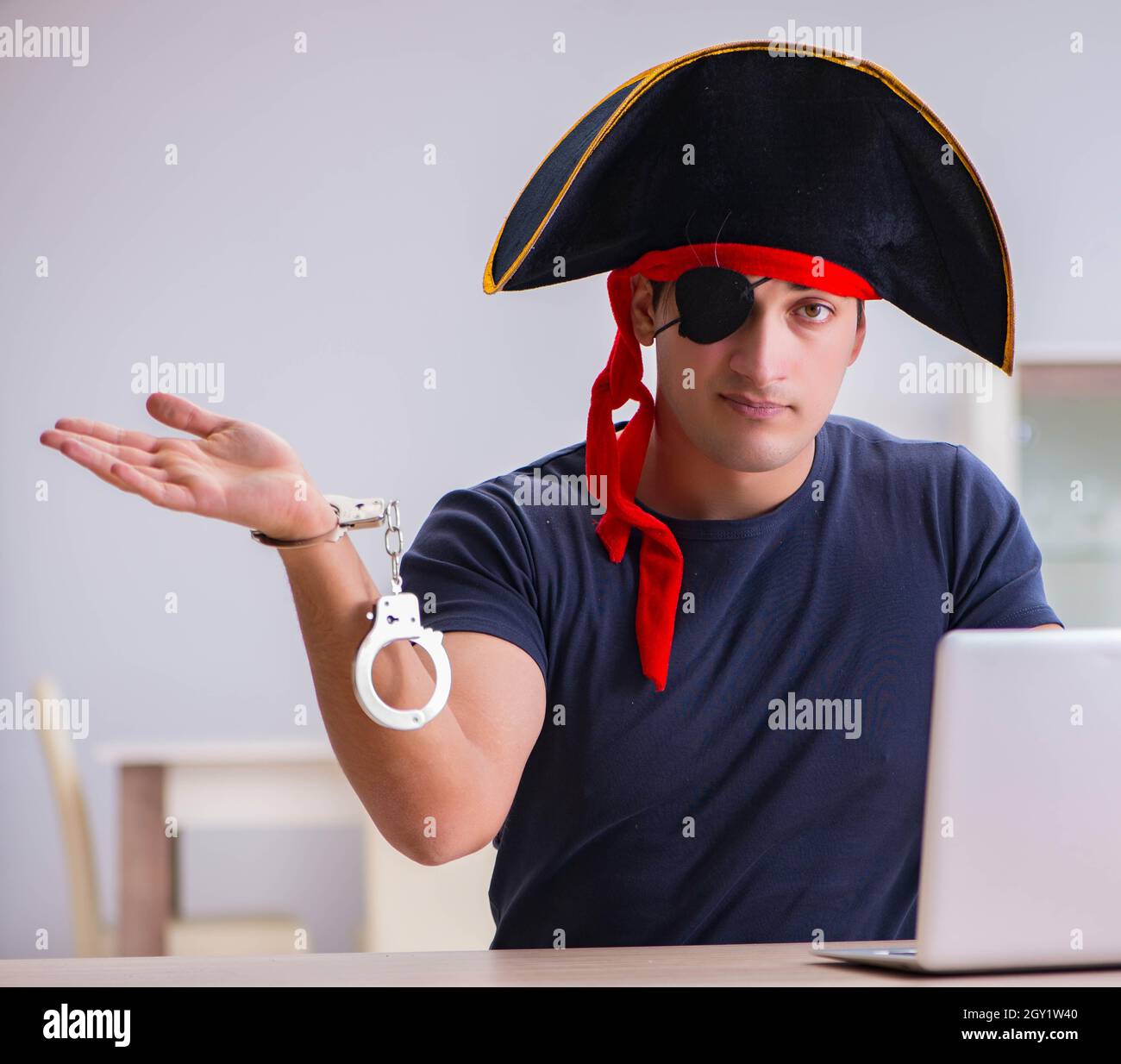The digital security concept with pirate at computer Stock Photo - Alamy