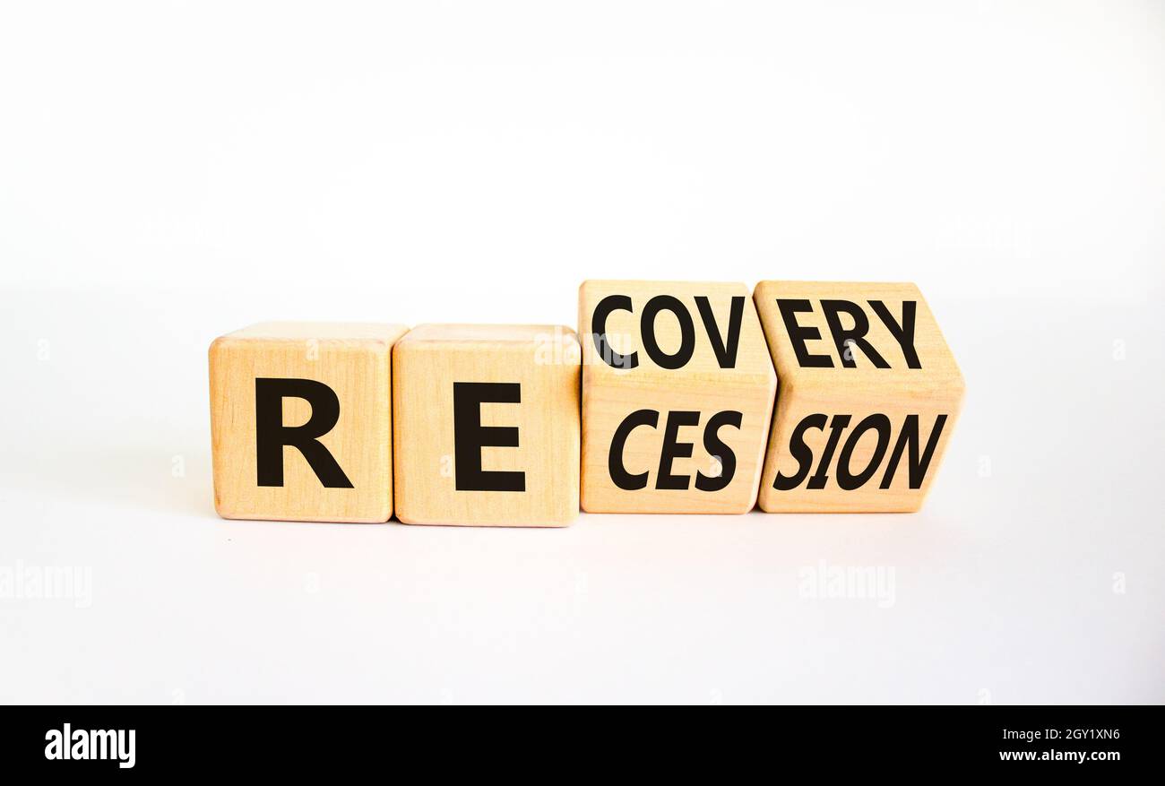 Recovery and recession symbol. Turned cubes and changed the word ...