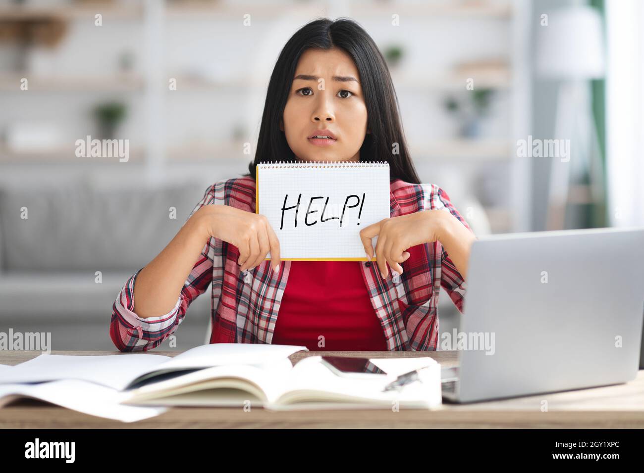 Distance Learning Stress. Frustrated Asian Lady Holding Leaflet With ...