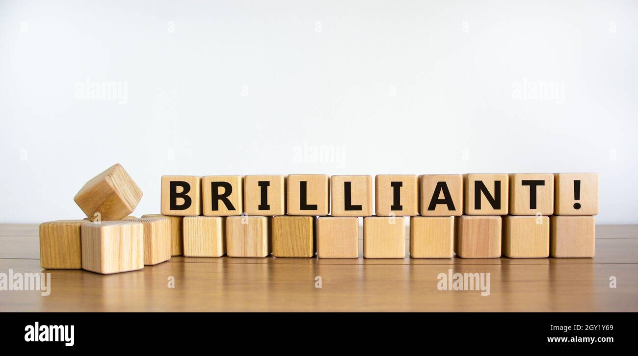 Brilliant symbol. The word brilliant on wooden cubes. Beautiful wooden ...