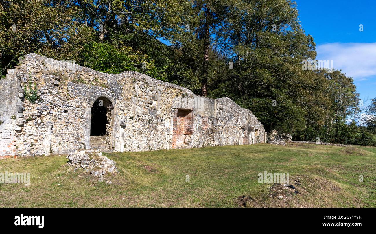 Ancient stone wall part of the former Southwick Priory bordering the ...