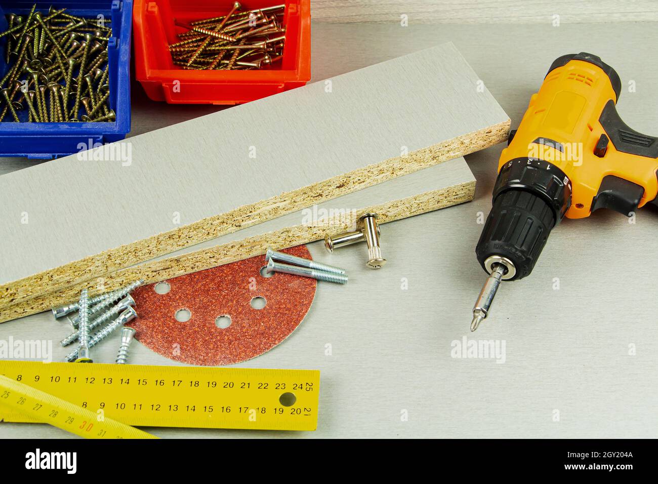 tools for repair and construction. Screwdriver, furniture screws ...