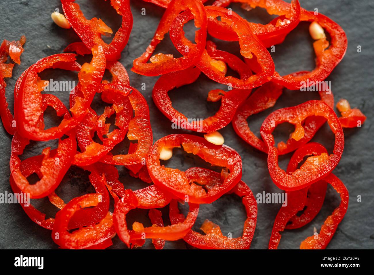 Chopped chilli on black background hi-res stock photography and images ...