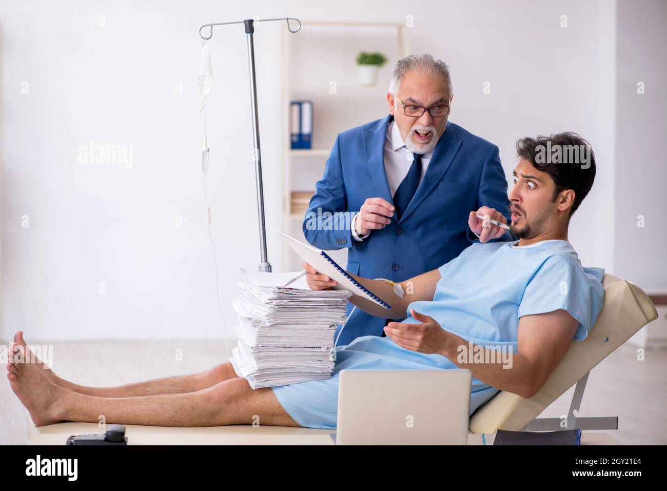 Young employee feeling bad at workplace Stock Photo - Alamy