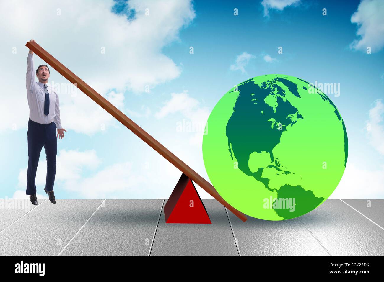 Businessman lifting the earth in the challenge concept Stock Photo - Alamy