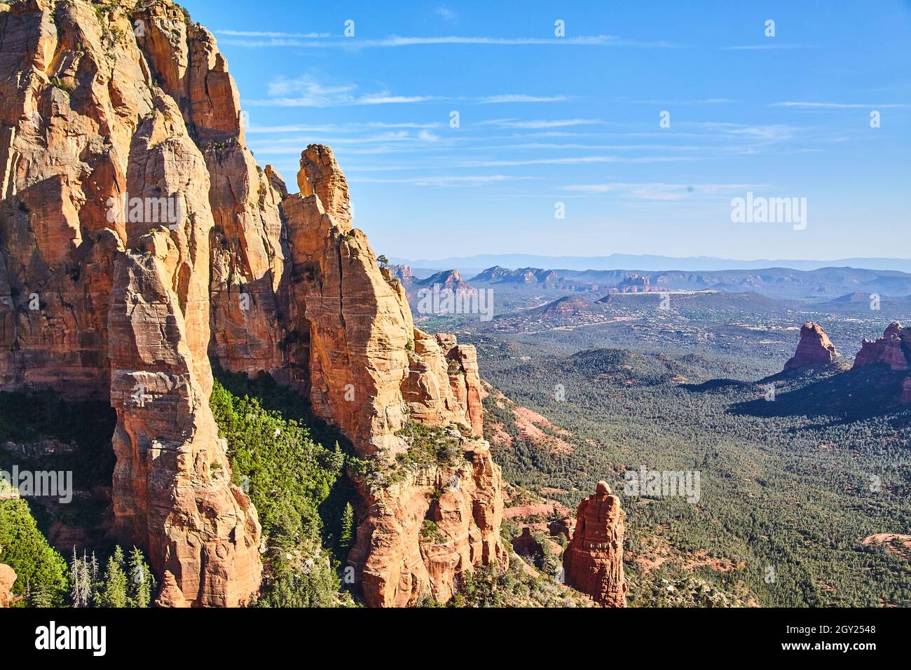 Red mountain pillars in desert aerial with green fields Stock Photo - Alamy