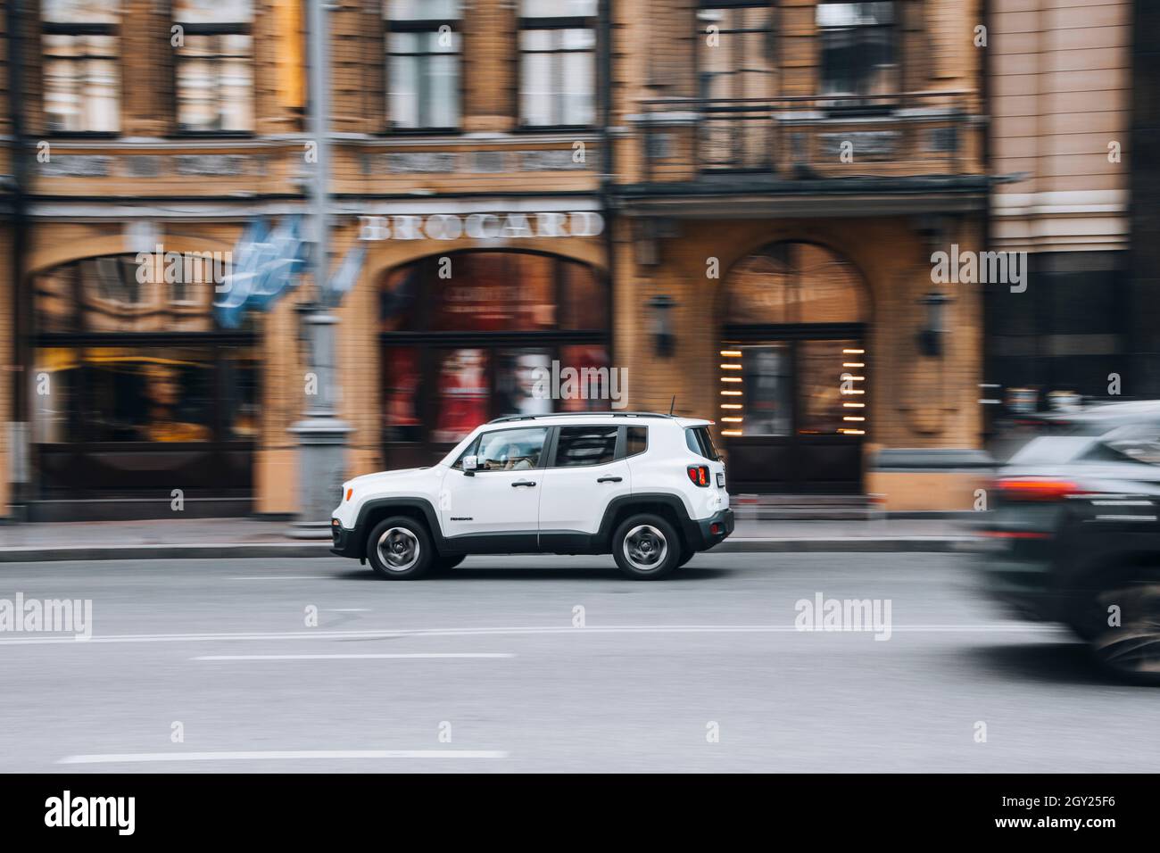 Ukraine, Kyiv - 2 June 2021: White Jeep Renegade car moving on the ...