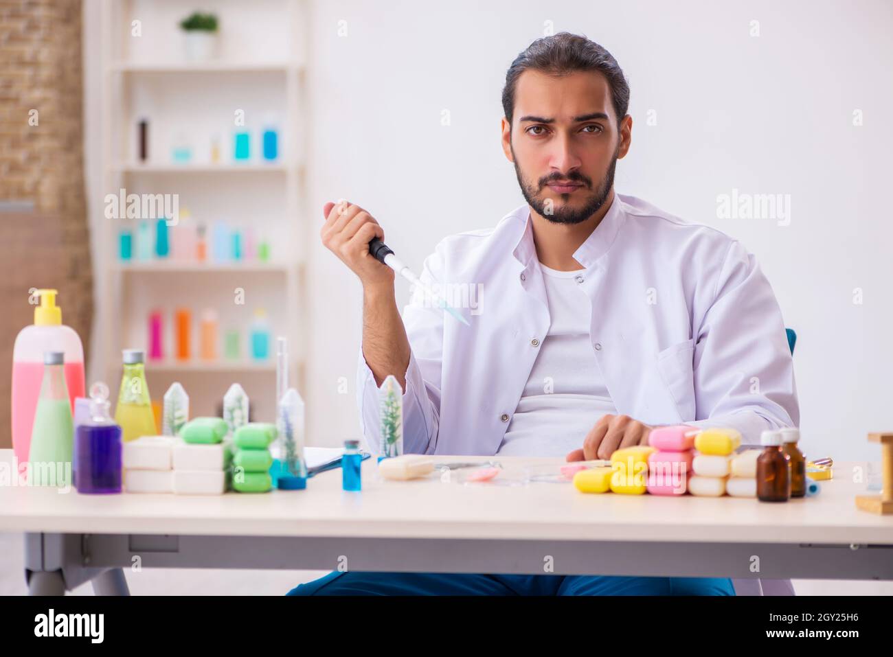 Young chemist testing soap in the lab Stock Photo - Alamy