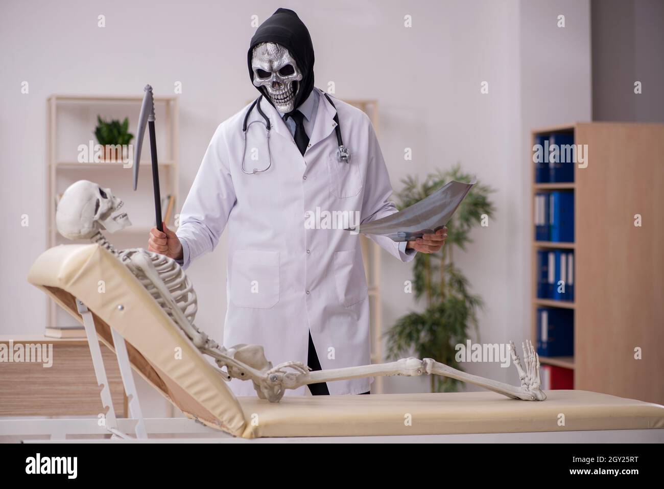 Devil doctor radiologist examining skeleton patient at the hospital ...