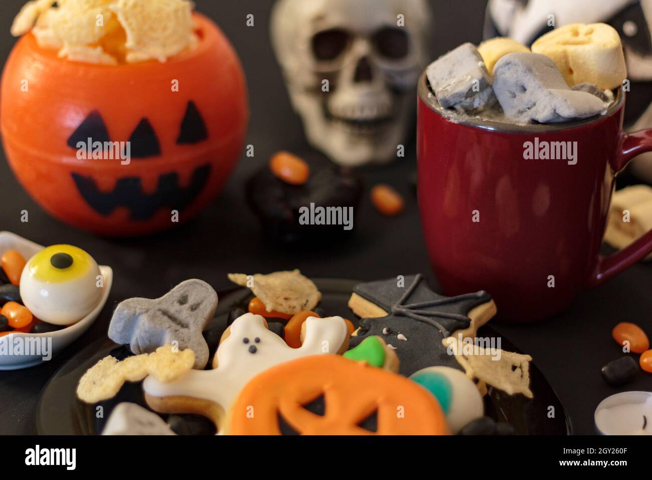 Halloween table with spooky food Stock Photo - Alamy