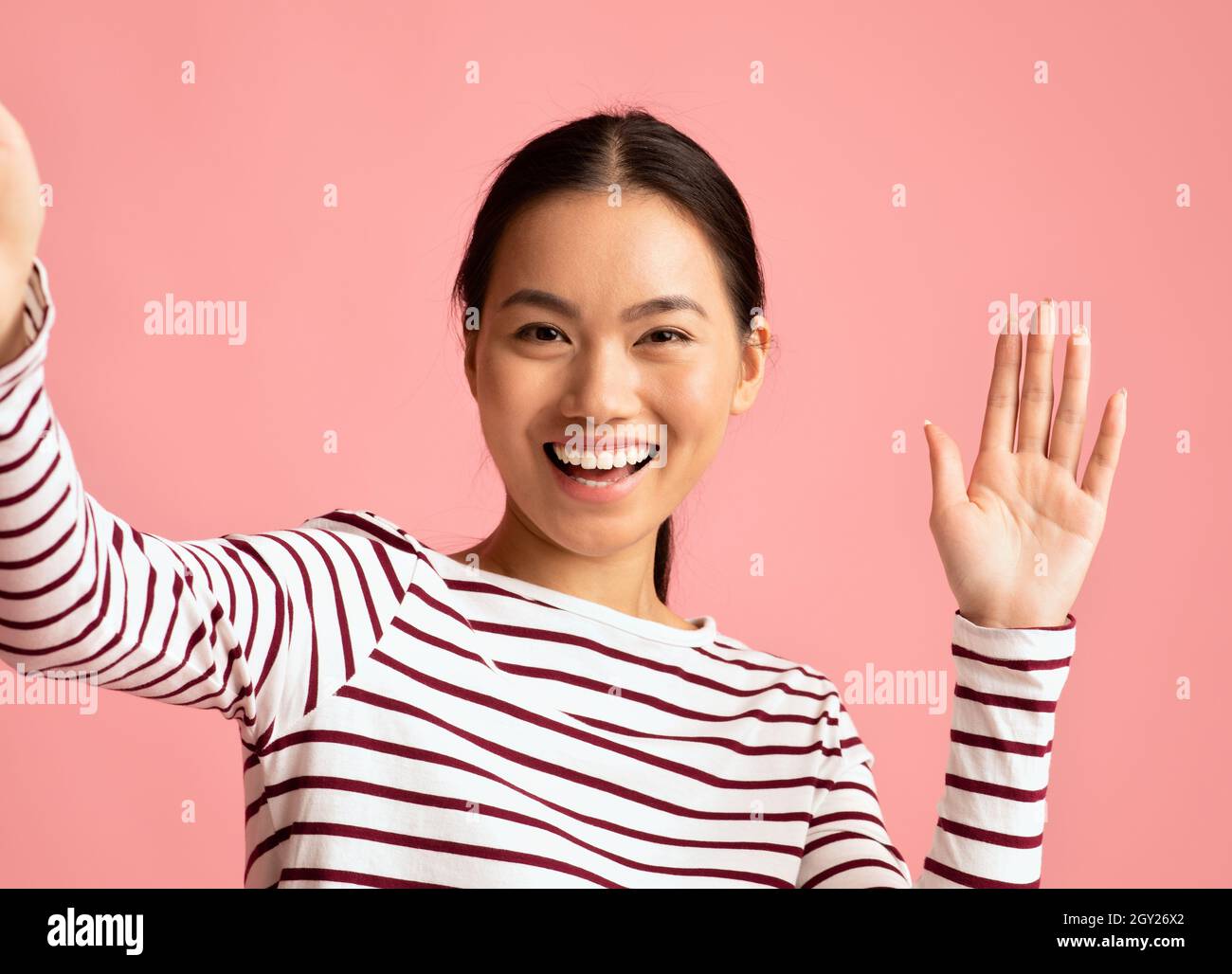 Hello. Cheerful Young Asian Female Taking Selfie And Waving Hand At ...