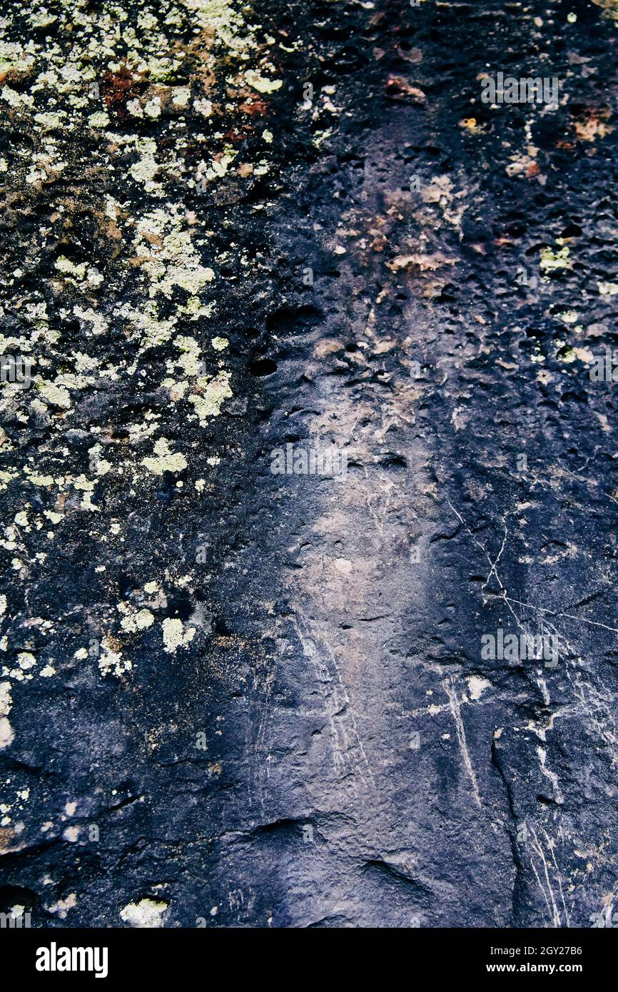 Detail of rock texture with scratches and lichen Stock Photo - Alamy