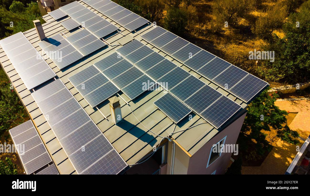 Large solar panel installation on roof Stock Photo - Alamy