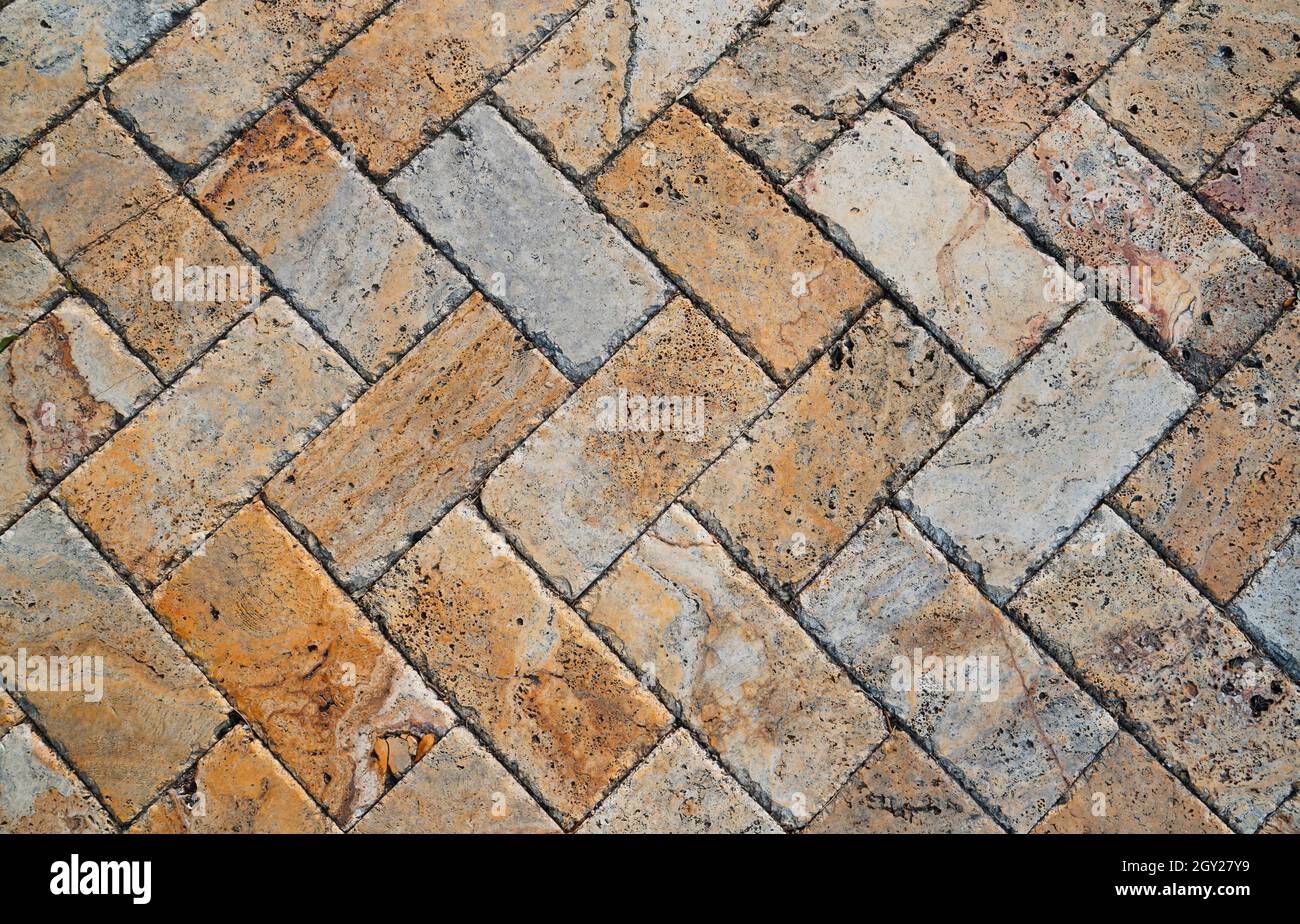 Yellow brown stone pavers background. Neutral texture of a flat brick ...
