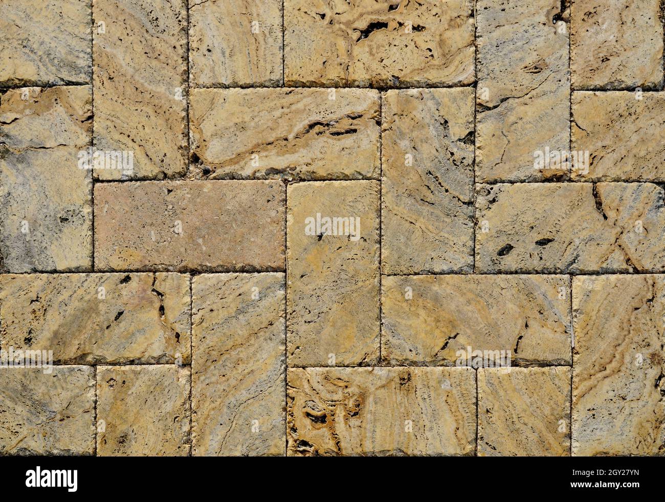 Yellow brown stone pavers background. Neutral texture of a flat brick ...