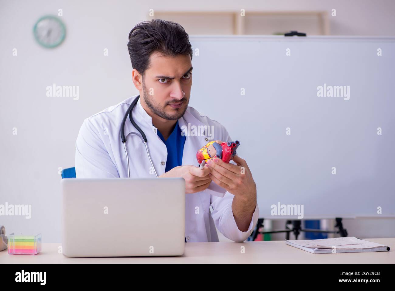 Young doctor cardiologist in the classroom Stock Photo - Alamy