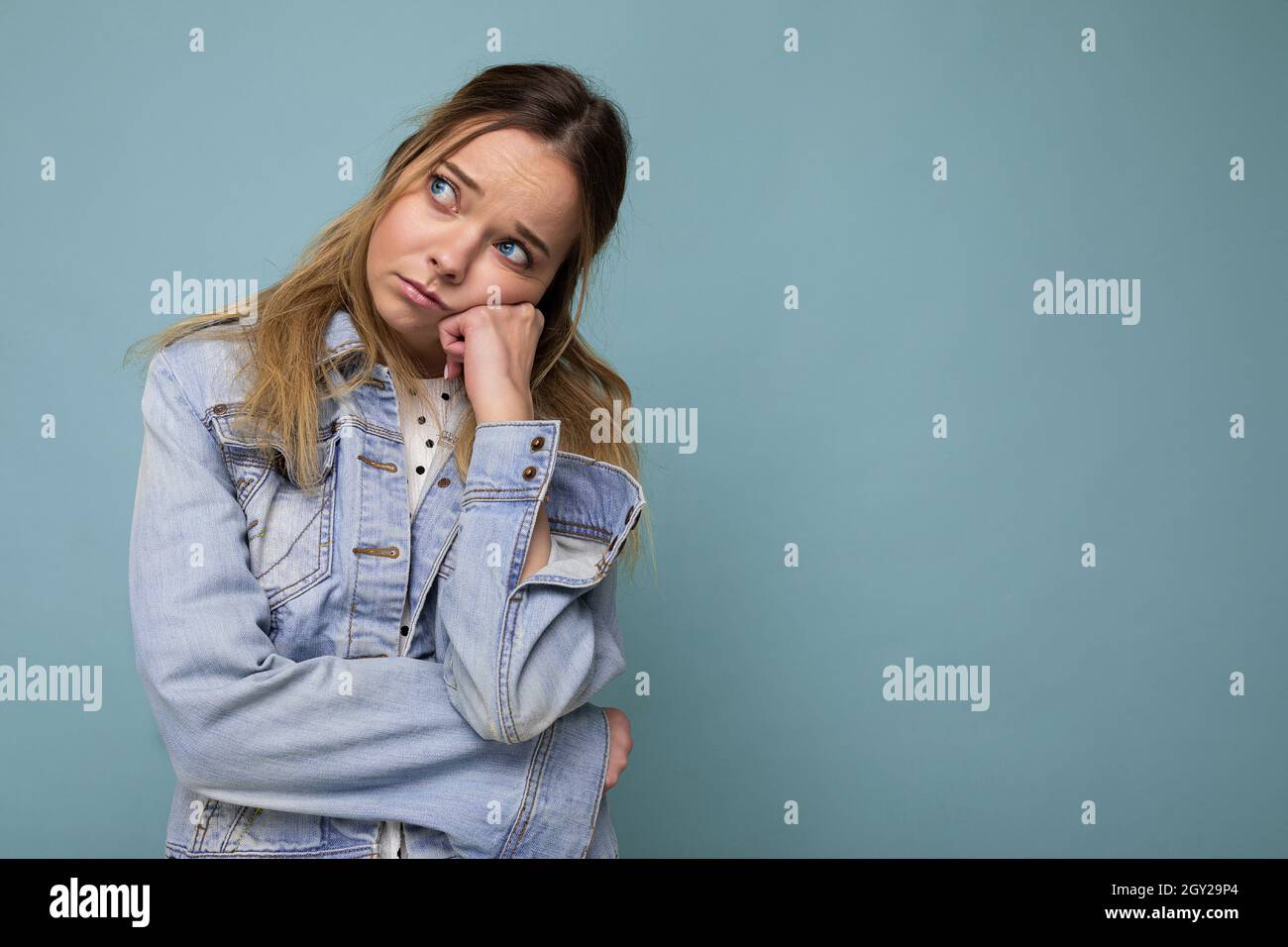Photo of young sad upset sorrowful beautiful blonde woman with sincere ...