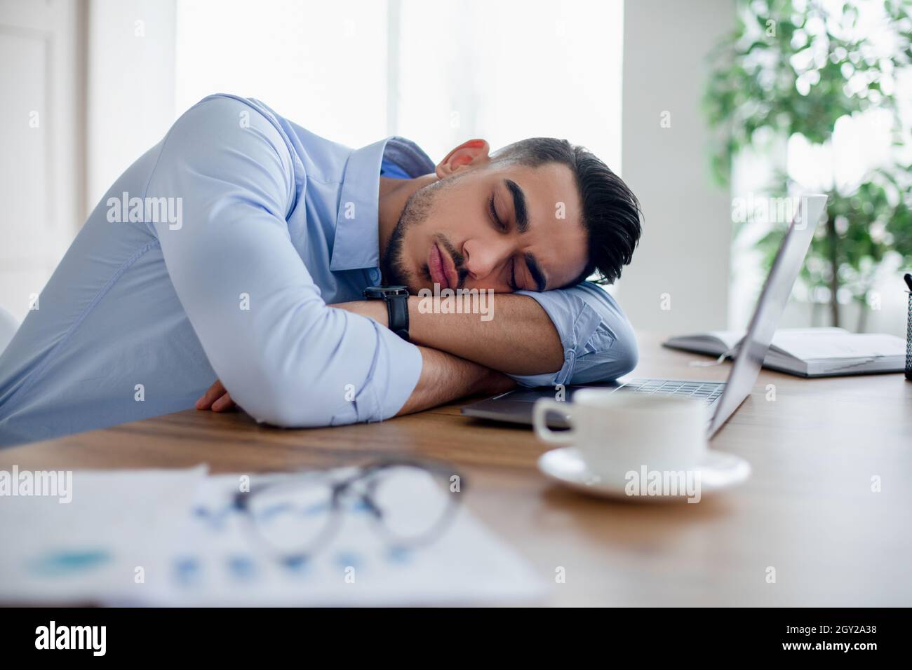 Workaholic man tired in front hi-res stock photography and images - Alamy
