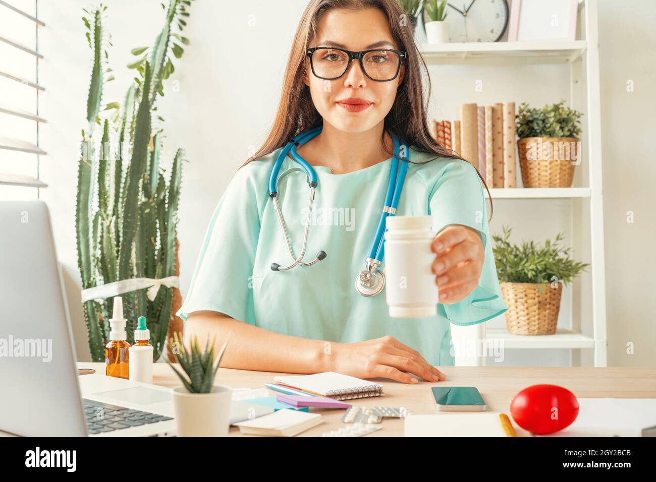 Female medicine doctor filling patient medical form or prescription ...