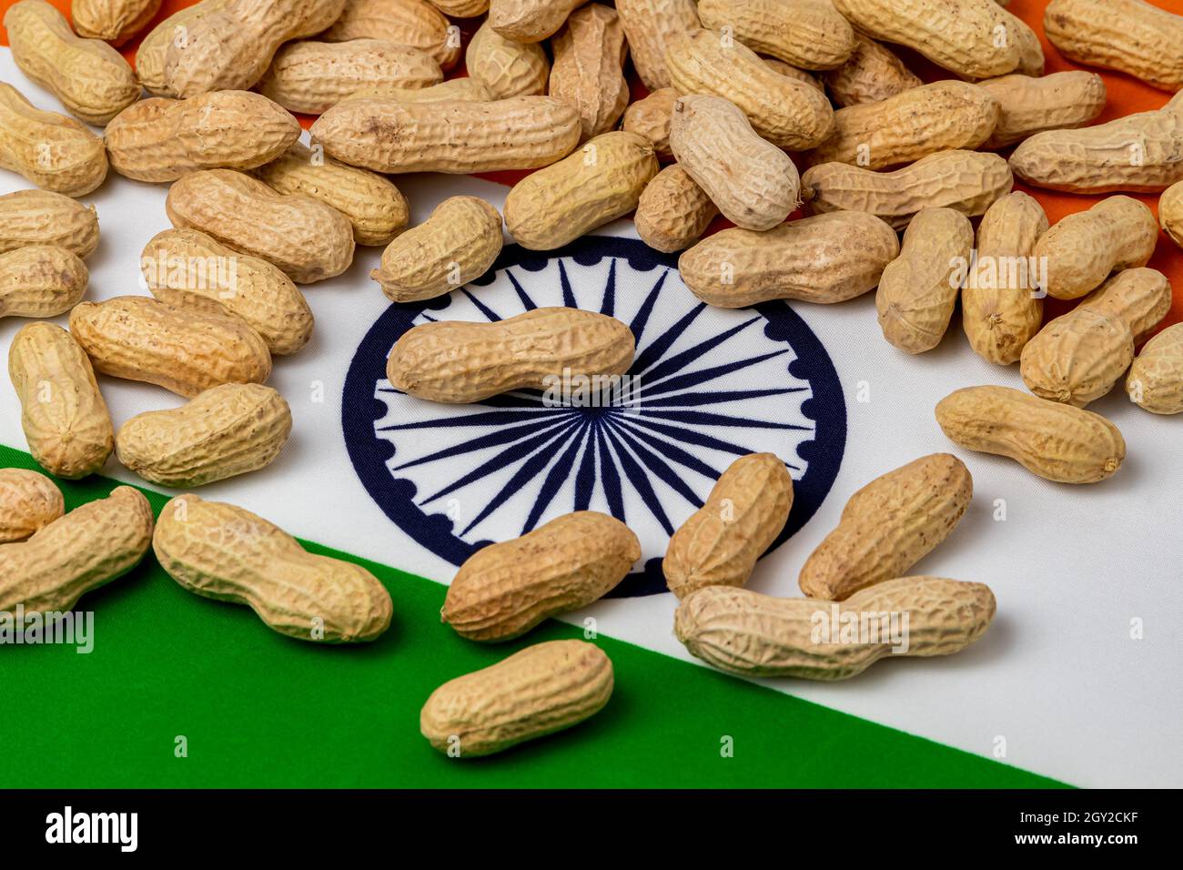 Peanuts in shell on flag of India. Peanut farming, trade, tariffs and ...