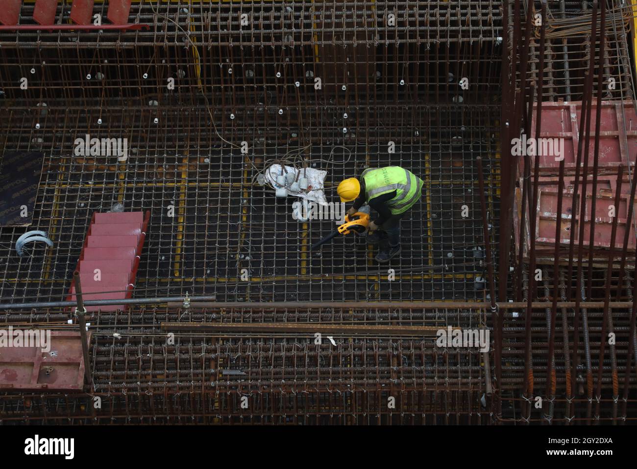 A constructor works at a station of the mass rapid transit(MRT) line ...