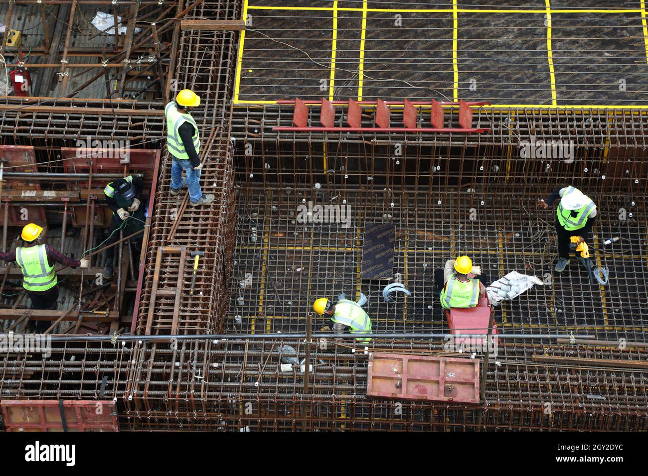 Constructors work at a station of the mass rapid transit(MRT) line ...
