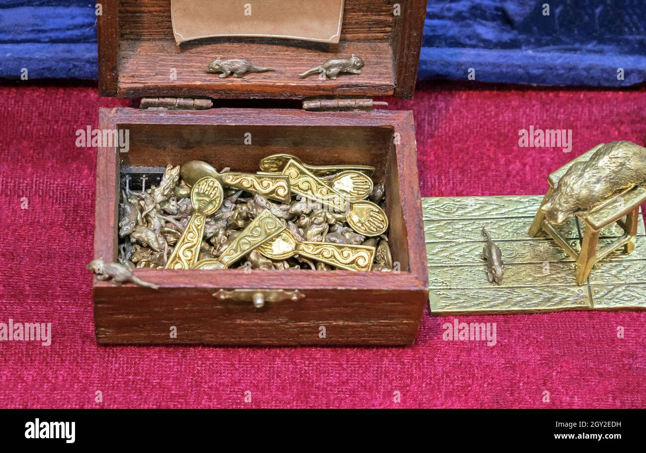 Old wooden casket with small bronze mice and spoons Stock Photo - Alamy