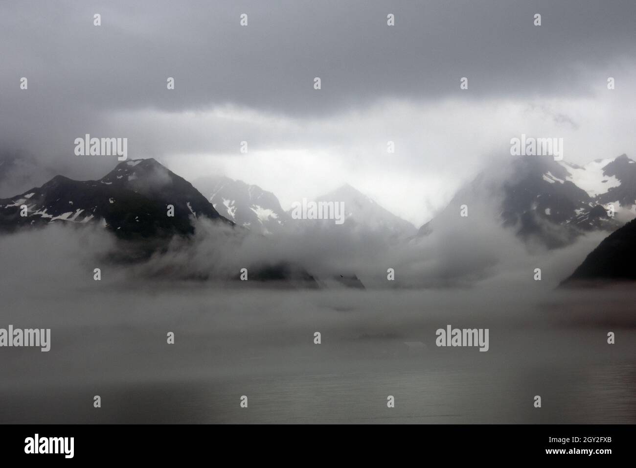 Thick fog on the coast of Fox Island, Resurrection Bay, Seward, Alaska ...