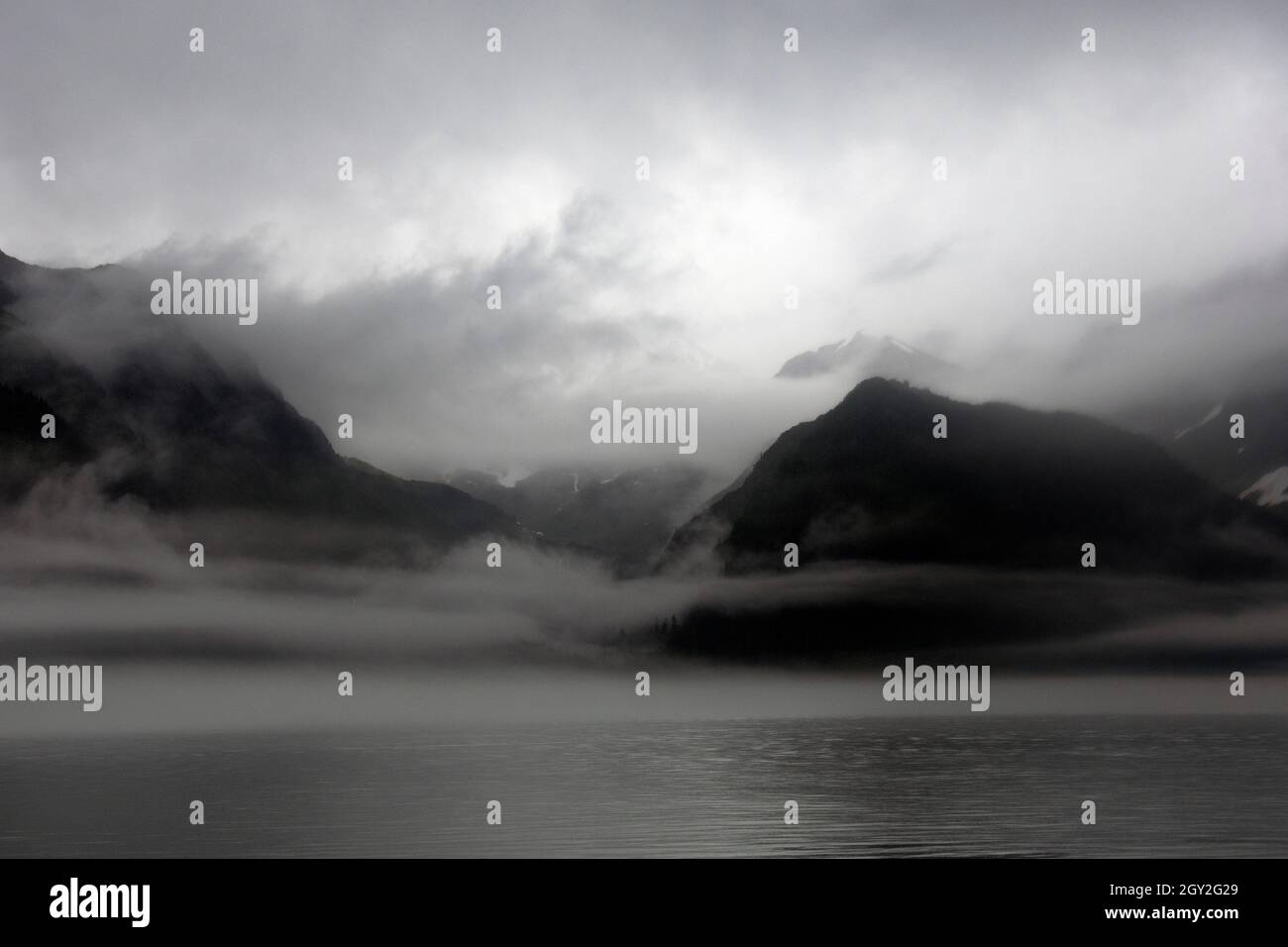Thick fog on the coast of Fox Island, Resurrection Bay, Seward, Alaska ...
