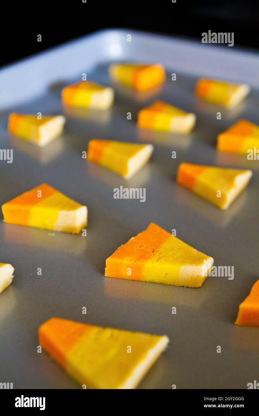 Tray of Halloween cookies like baked candy corn Stock Photo - Alamy