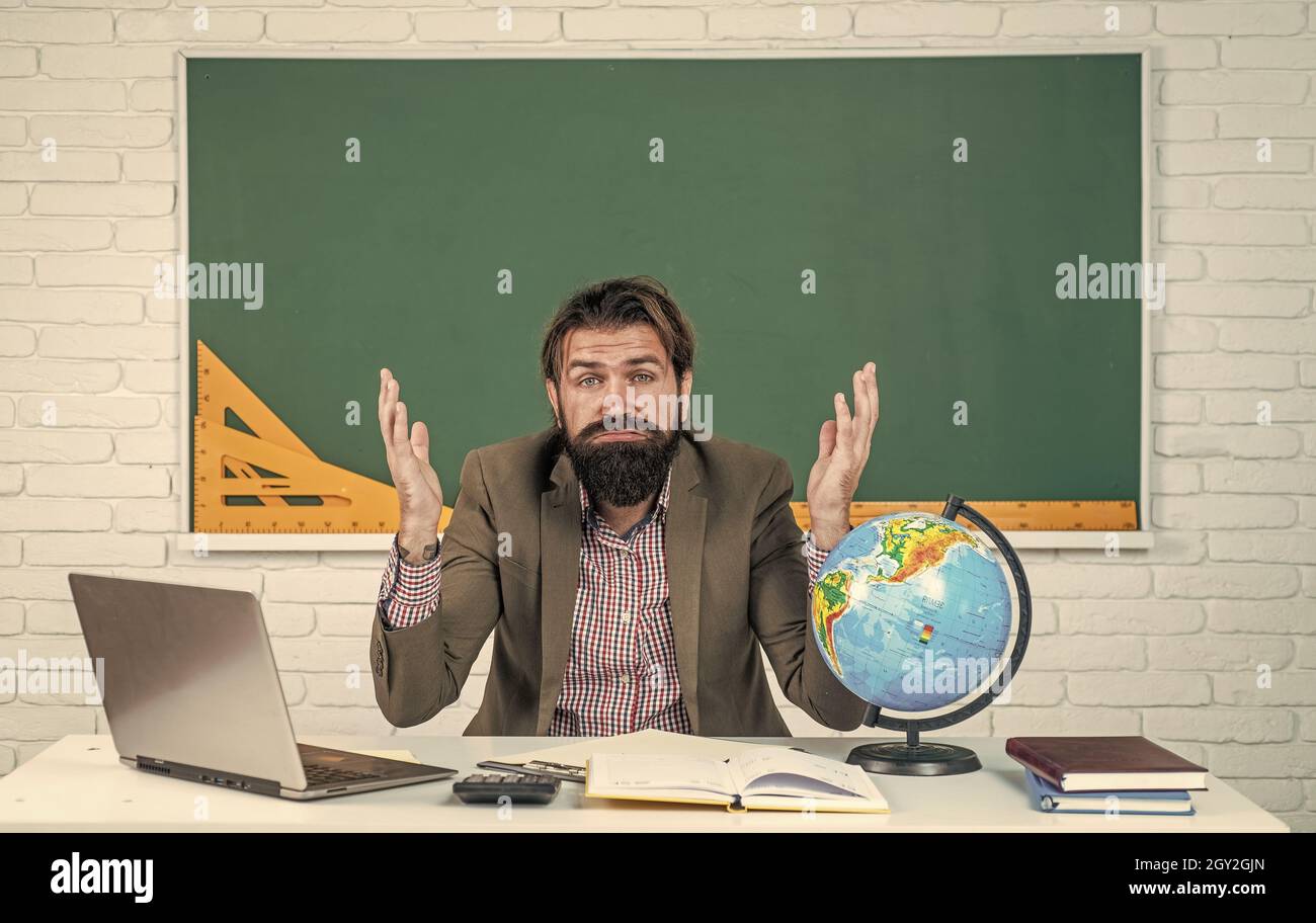 overworked man with beard having stress. troubles in studying. formal ...